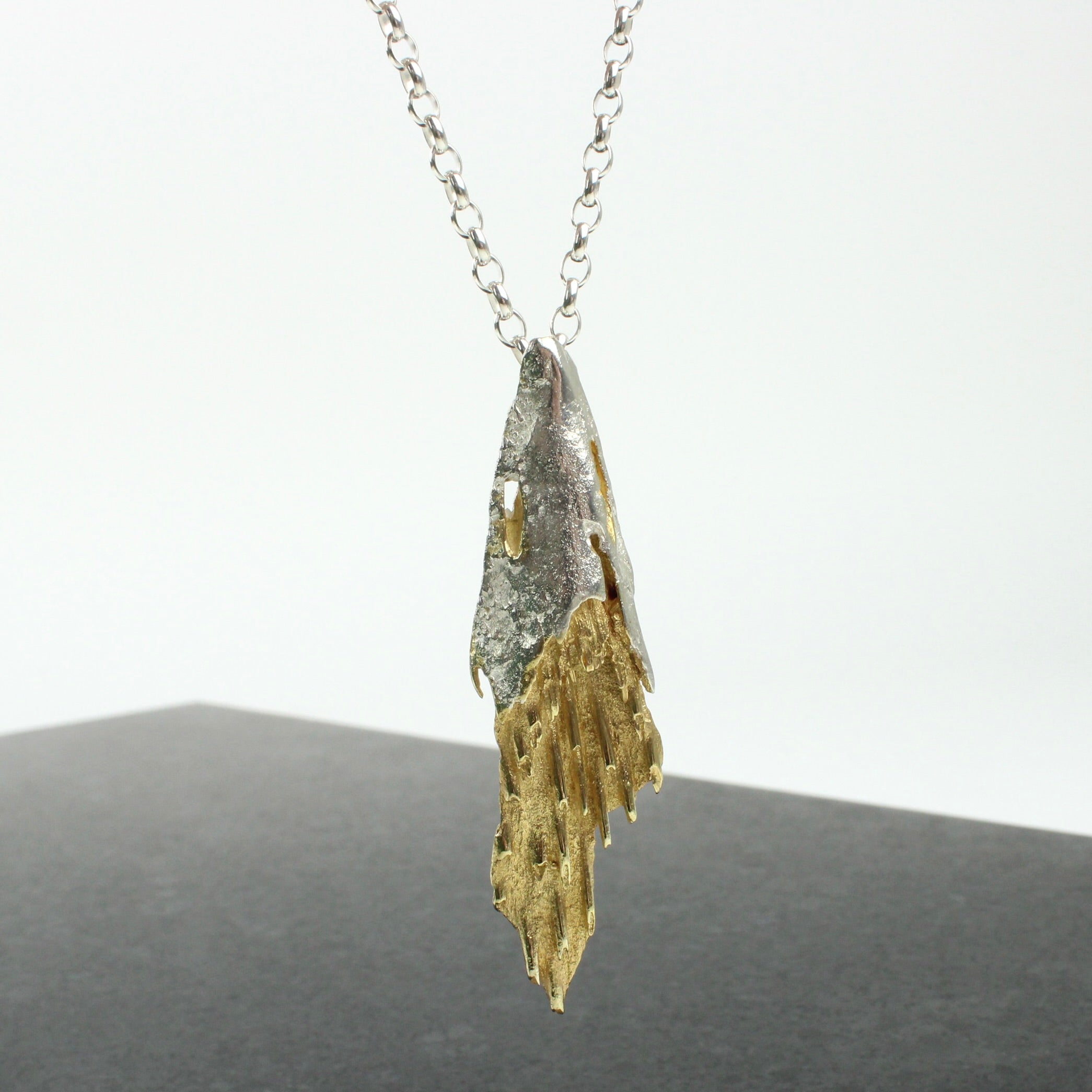Gold Punga textures pendant – Kina NZ Design + Artspace