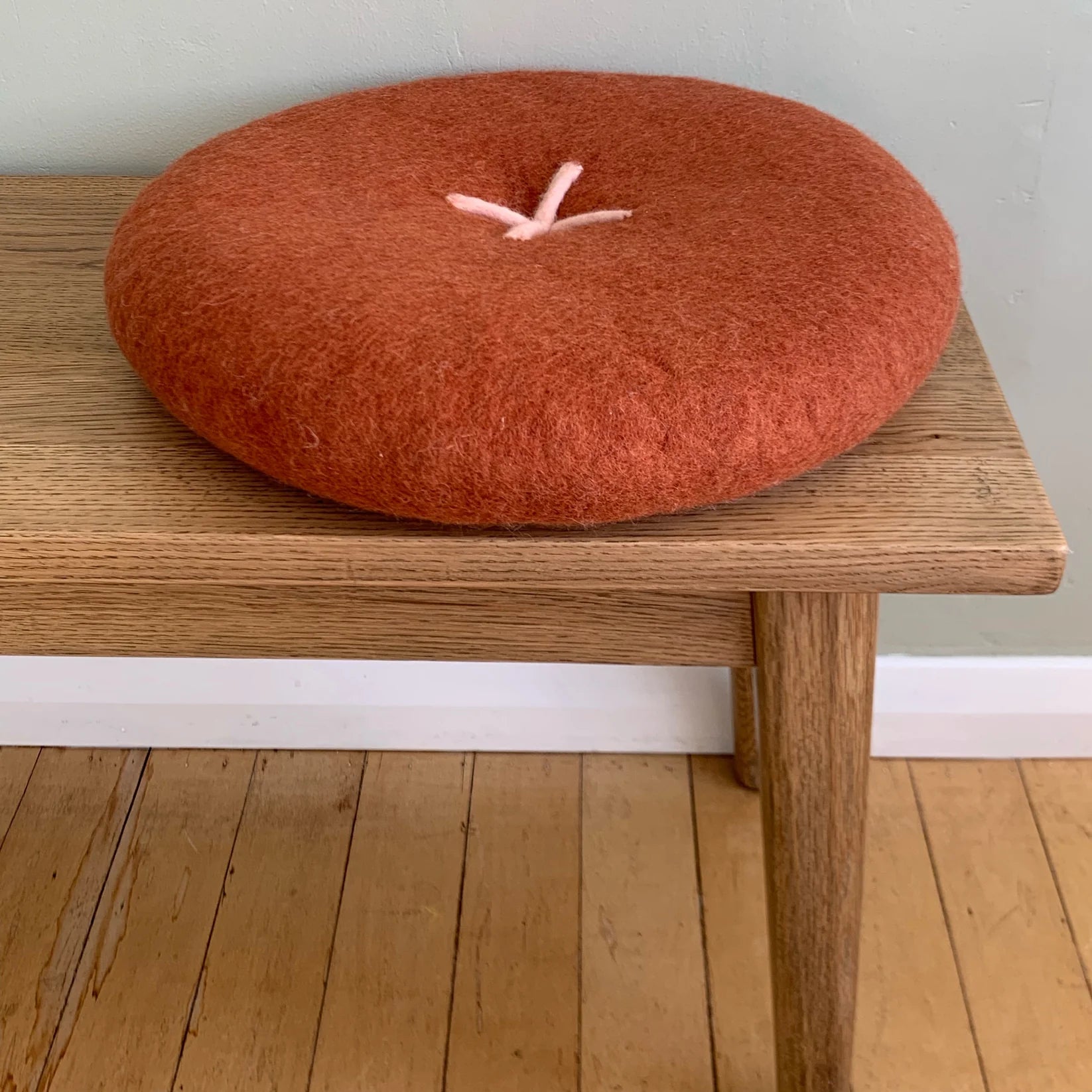 Button cushion - Rust – Kina NZ Design + Artspace